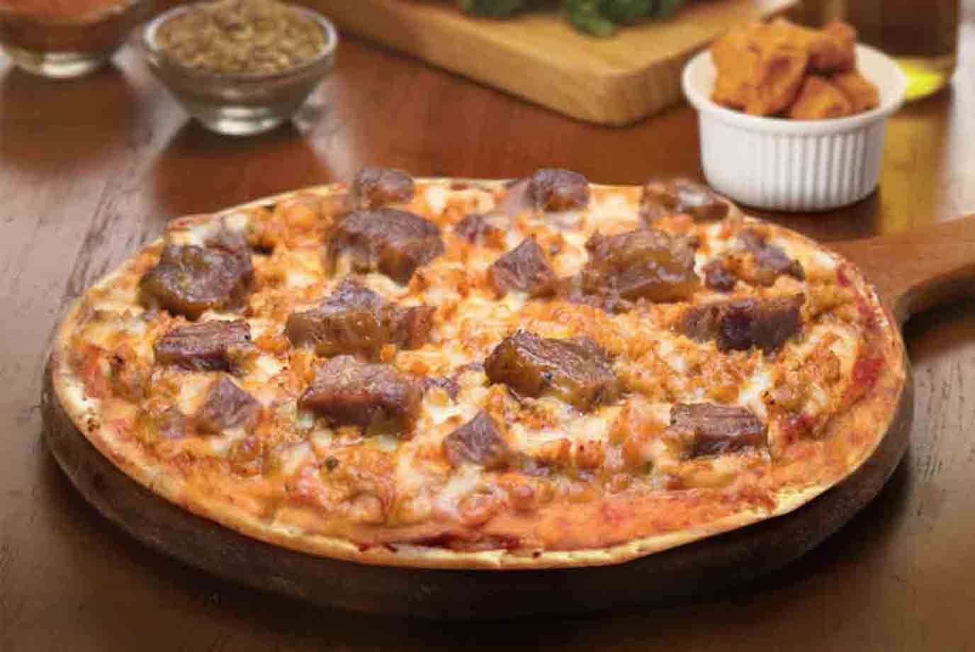 Order Mutton Overload Cheese Burst Pizza Serves 2 from Ovenstory on EatSure