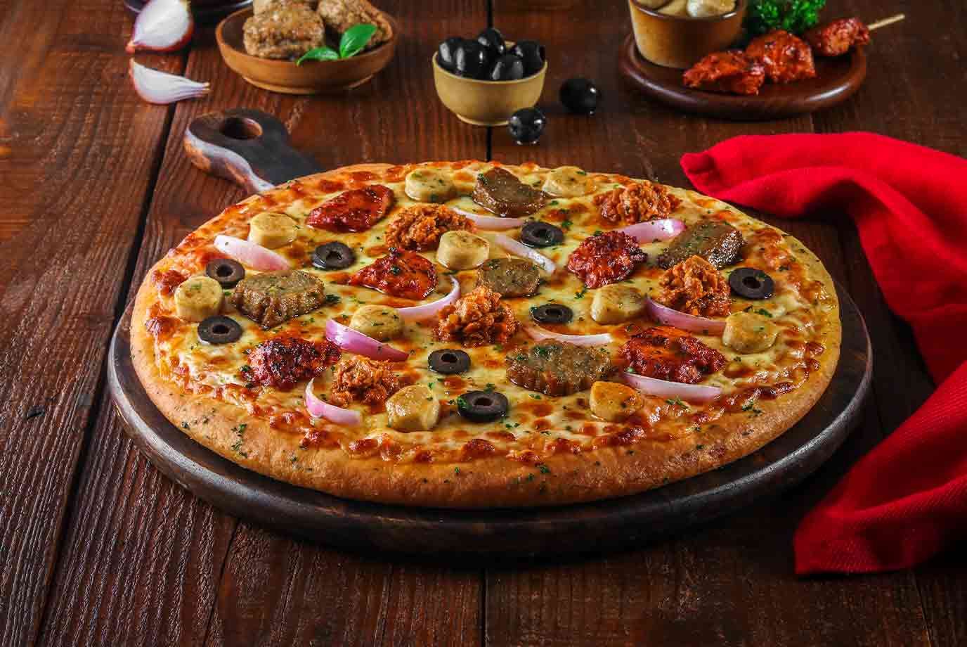 Order Chicken Maximus Pizza Medium online from Ovenstory