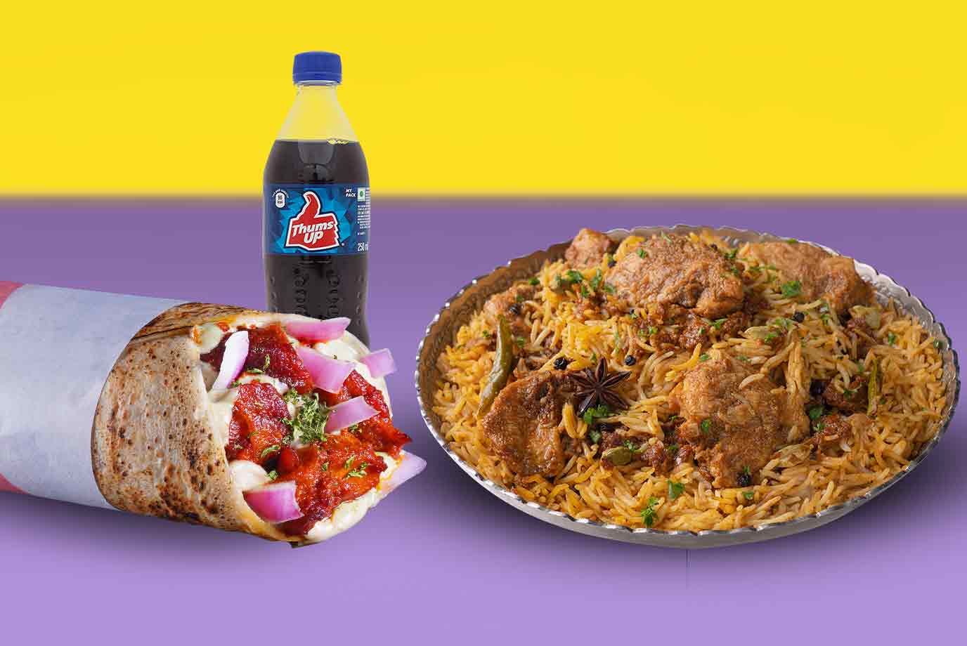 Order Hyderabadi Chicken Biryani With Masala Chicken Wrap And Thums Up ...