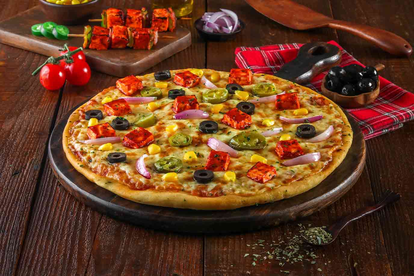 Order Tandoori Paneer Tikka Pizza Medium from Ovenstory on EatSure