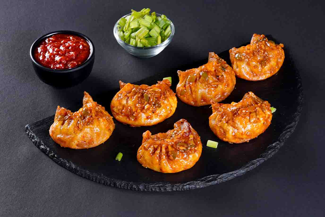 Order Wok Tossed Chicken Momos In Schezwan Sauce 6 Pcs from Mandarin ...